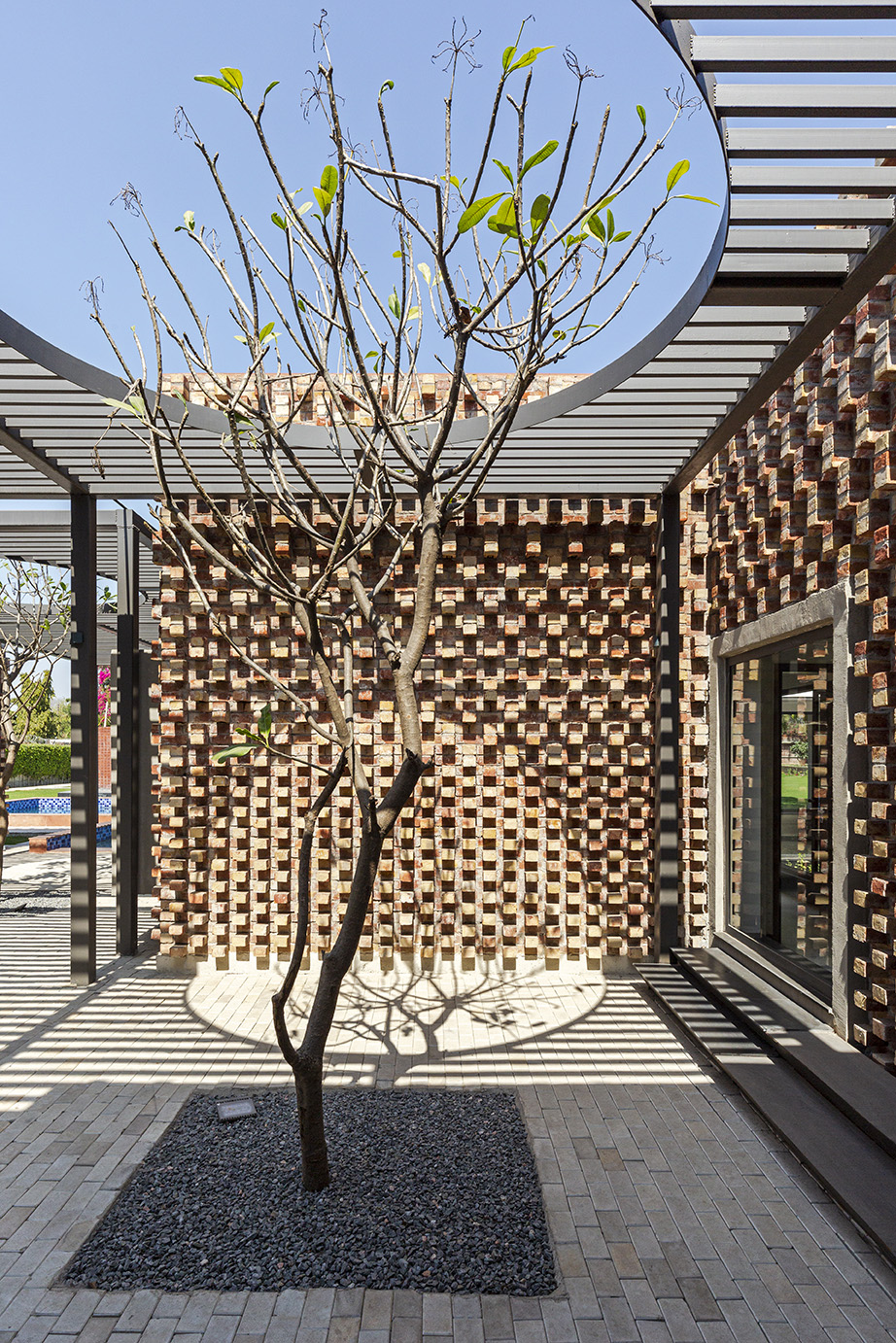 Brick Facade House | RLDA Architecture Gives A Perforated and Projected ...